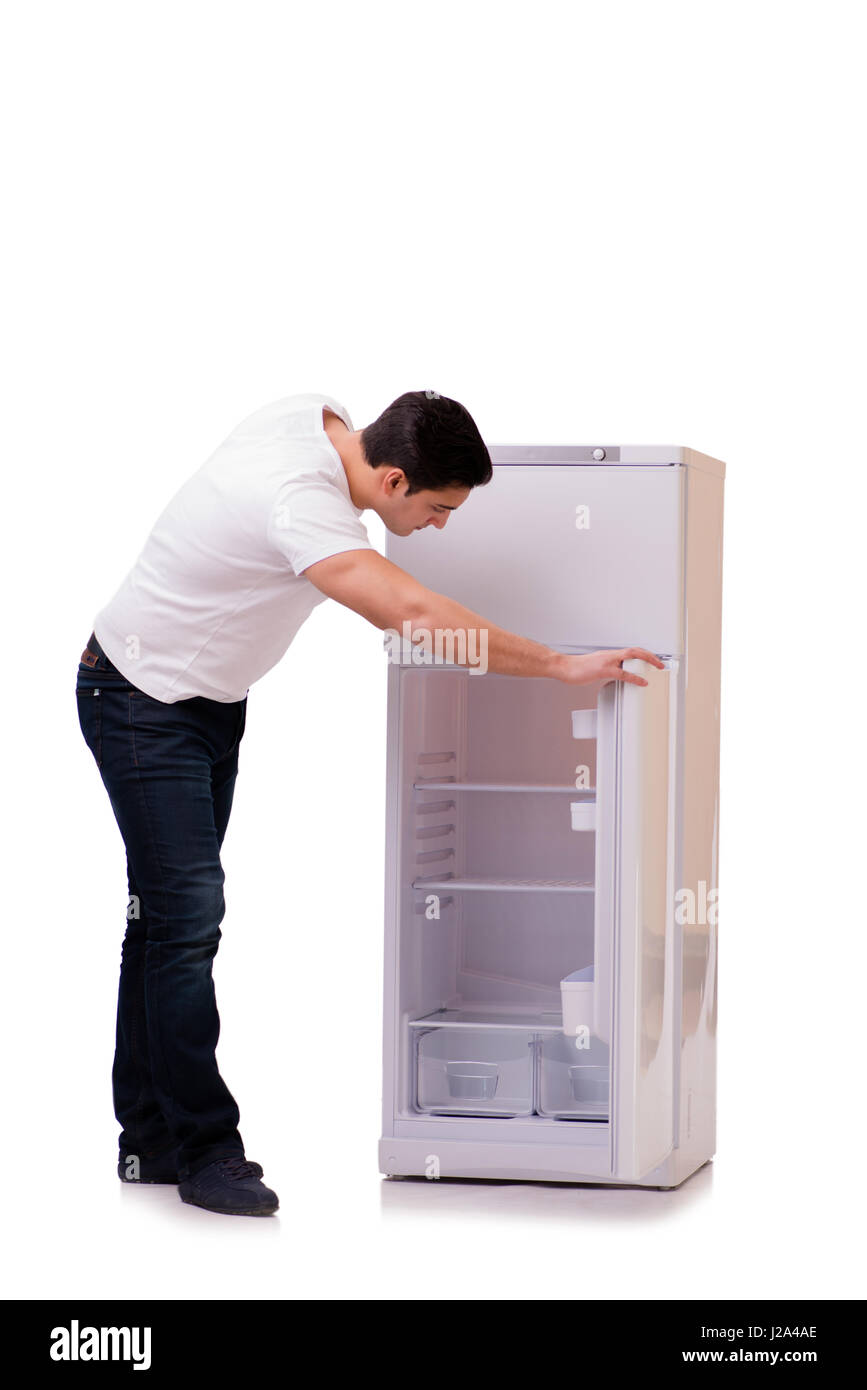 Funny man looking refrigerator hi-res stock photography and images - Alamy
