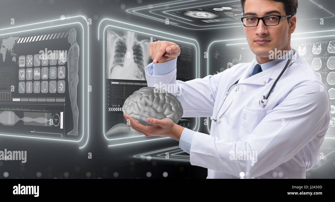 Male doctor with the brain in medical concept Stock Photo - Alamy