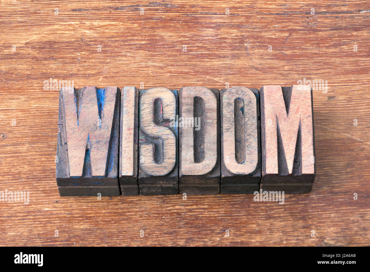 wisdom word made from wooden letterpress type on grunge wood Stock ...