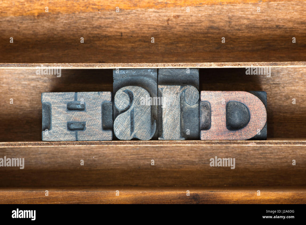 hard word made from vintage letterpress type on wooden tray Stock Photo ...