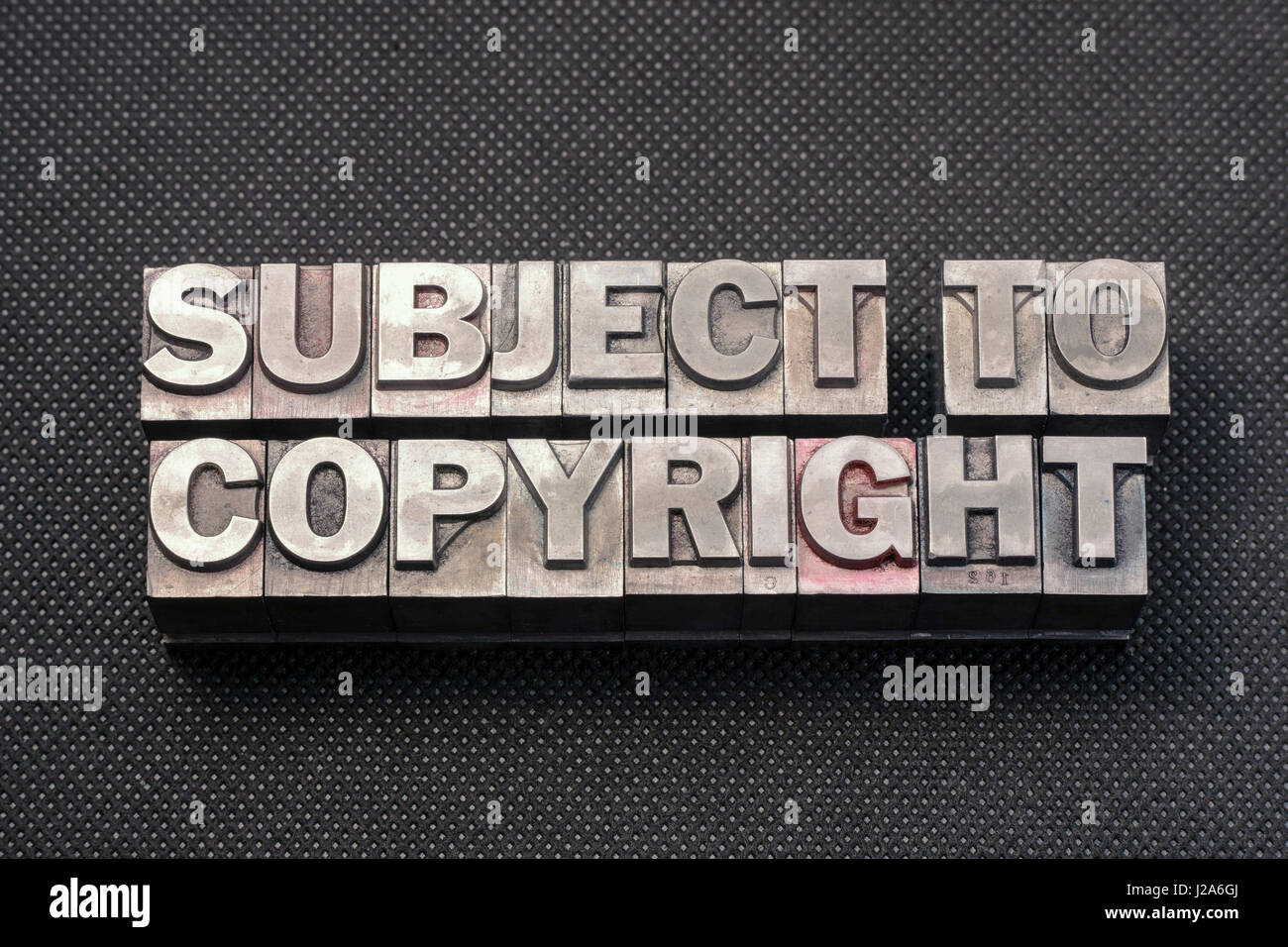 subject to copyright phrase made from metallic letterpress blocks on ...