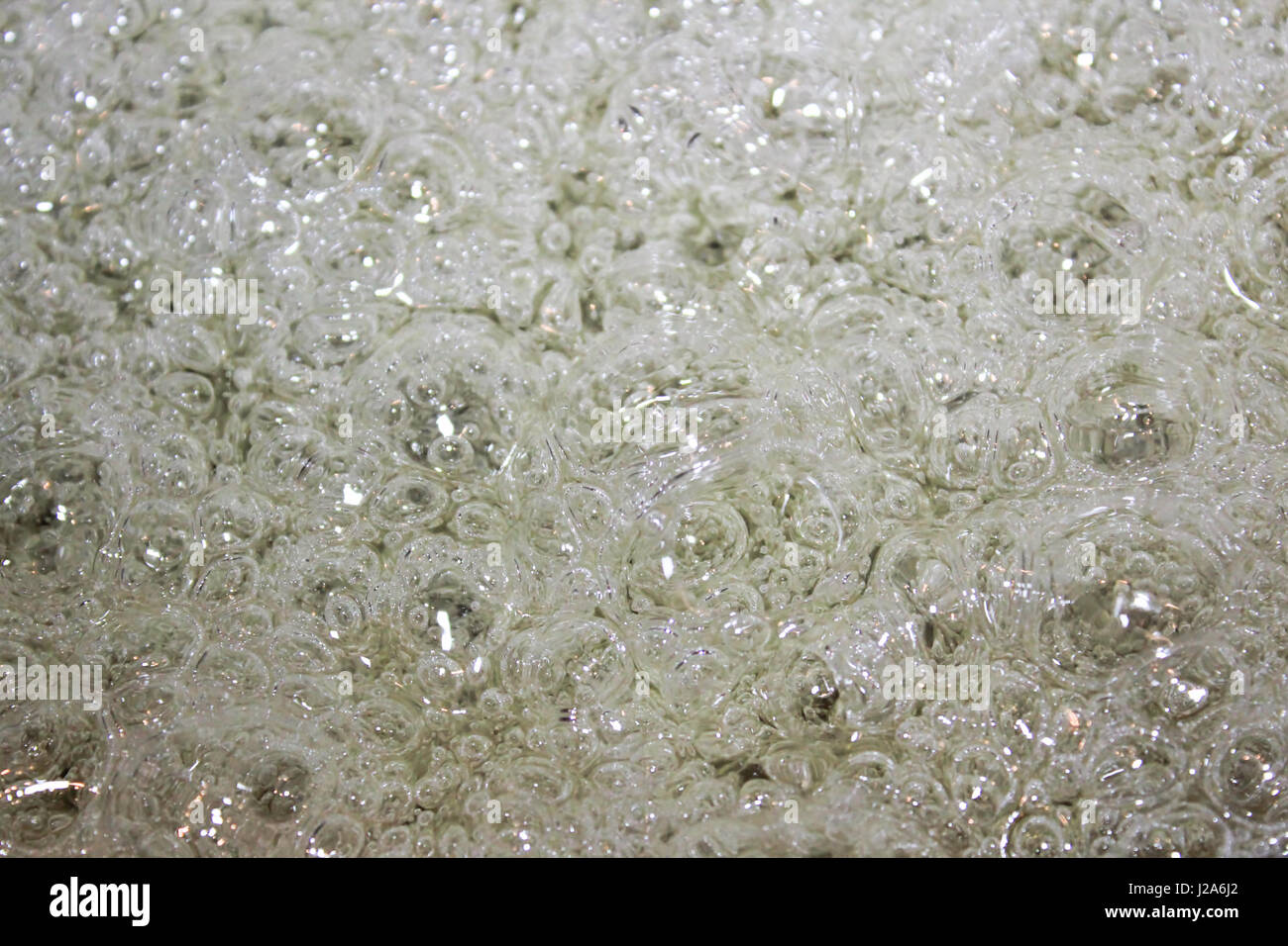 A thick liquid boiling rapidly Stock Photo - Alamy