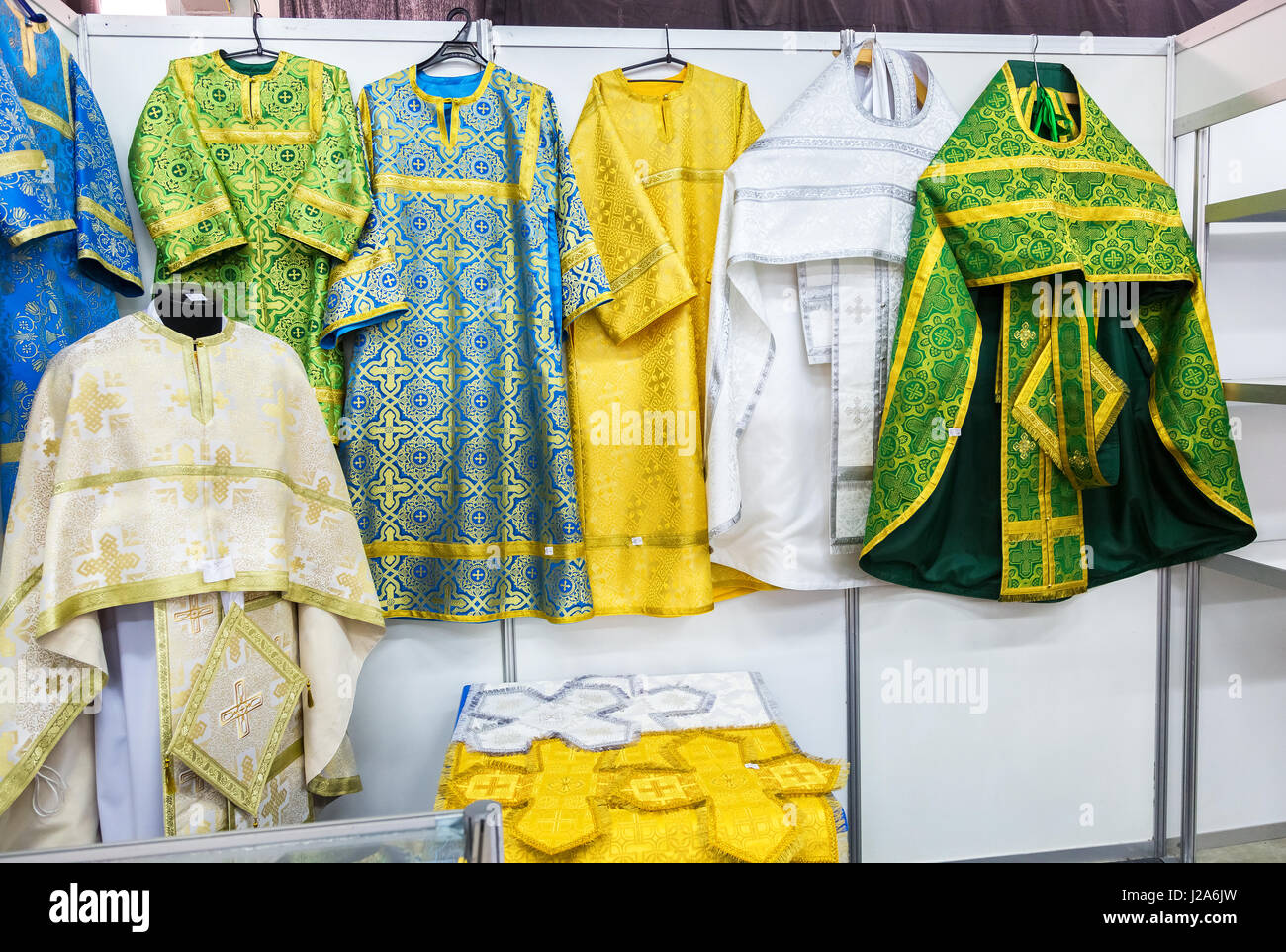 Different solemn slavic orthodox priest's robes Stock Photo - Alamy