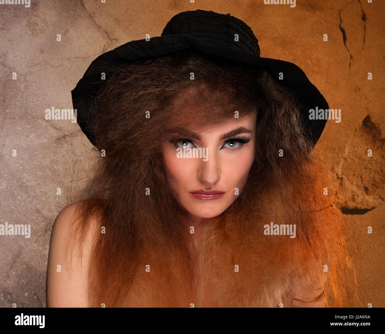 blue eye lady with a black hat Stock Photo - Alamy