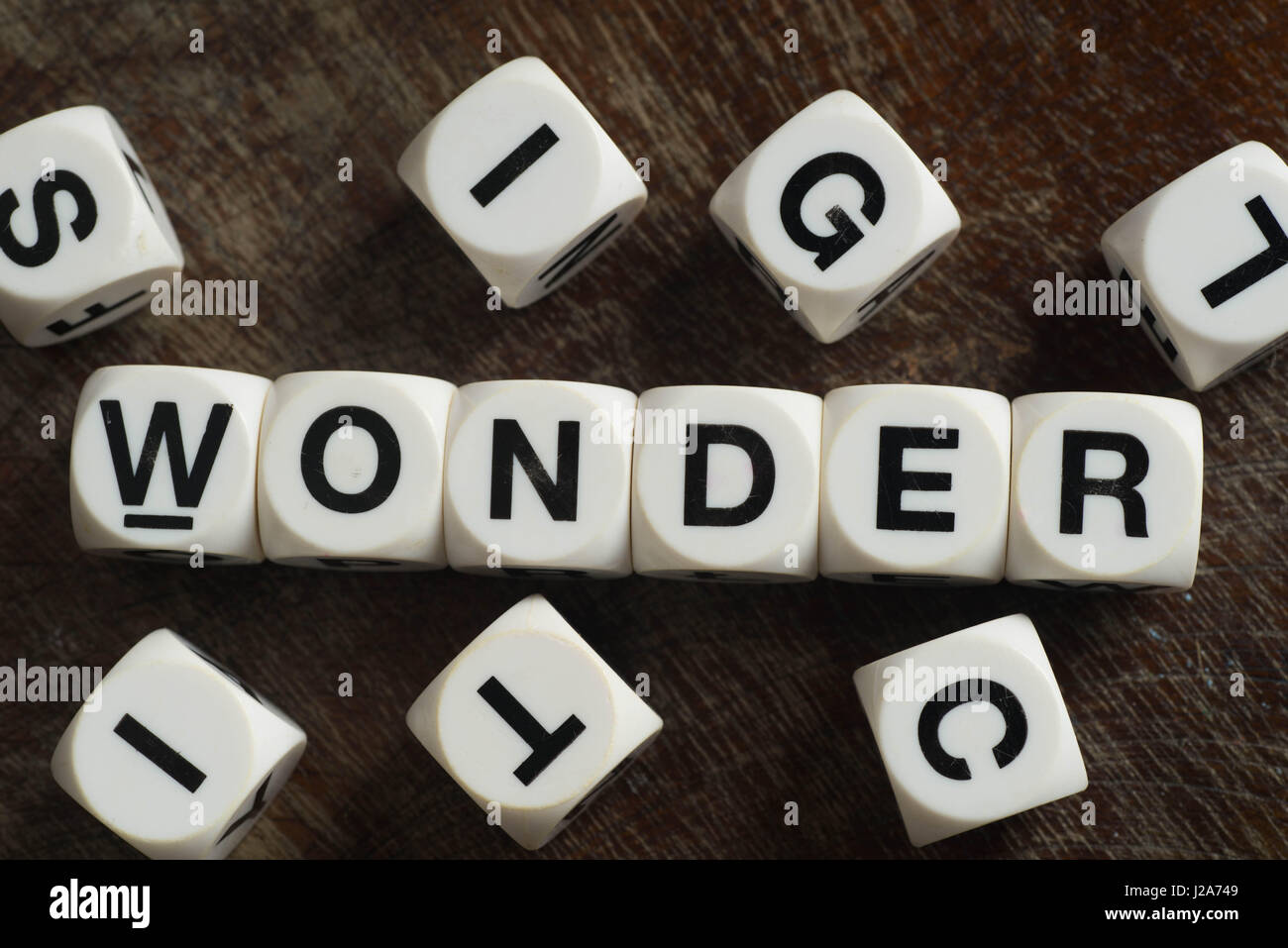 word wonder on white toy cubes Stock Photo - Alamy