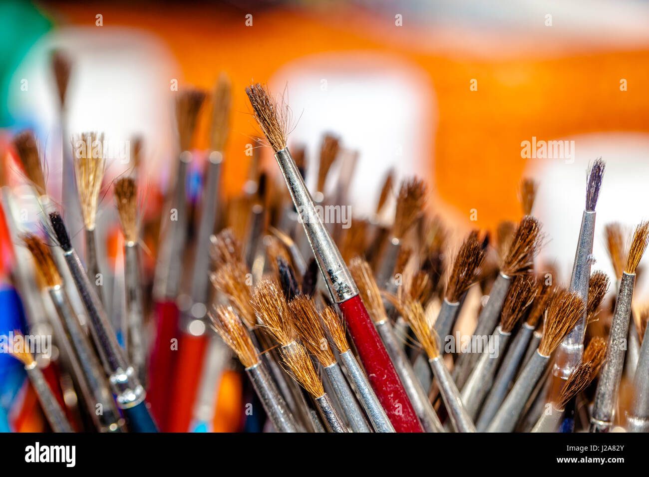 Stacked brushes in supermarket Stock Photo - Alamy