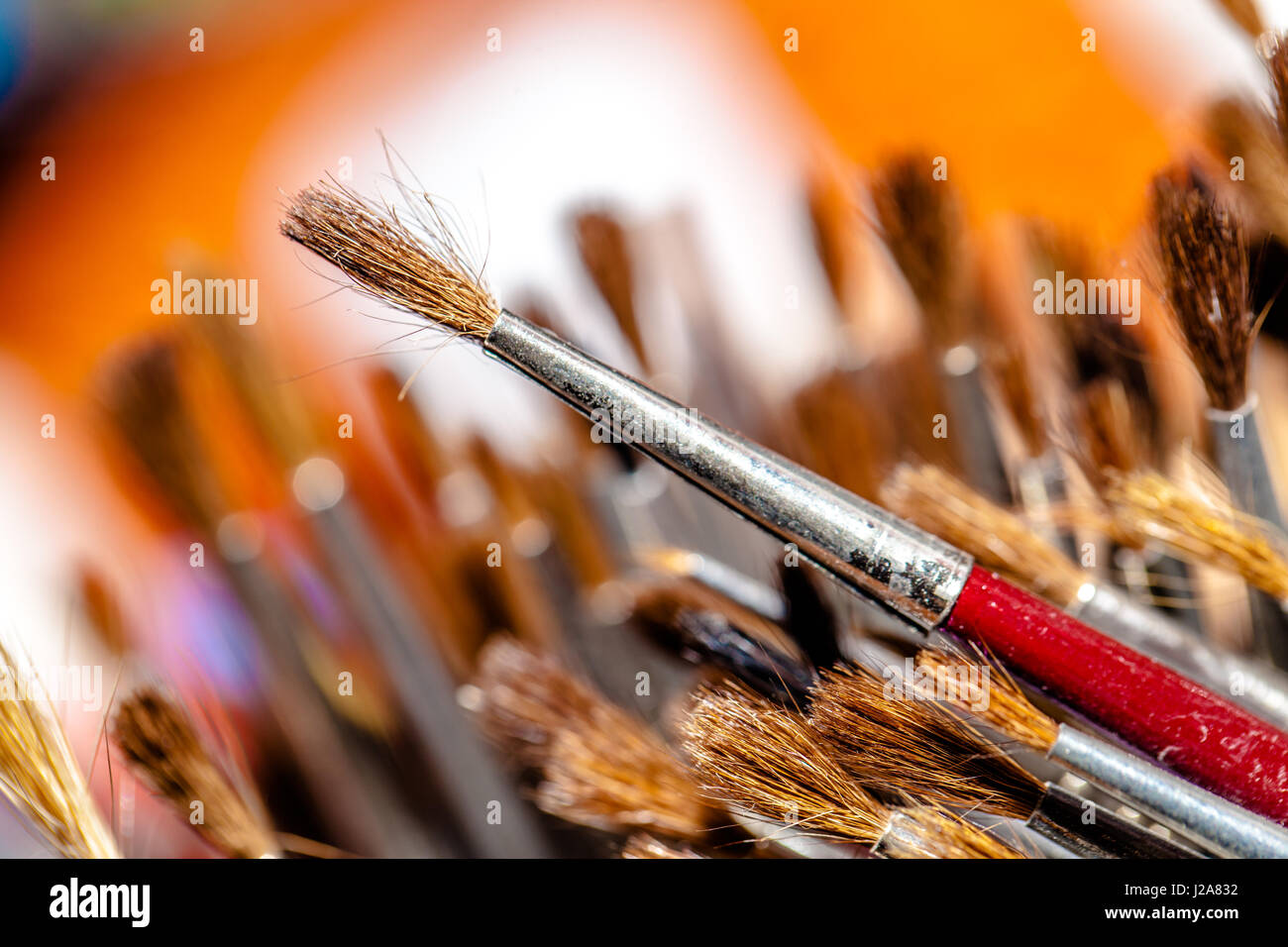 Stacked brushes in supermarket Stock Photo - Alamy