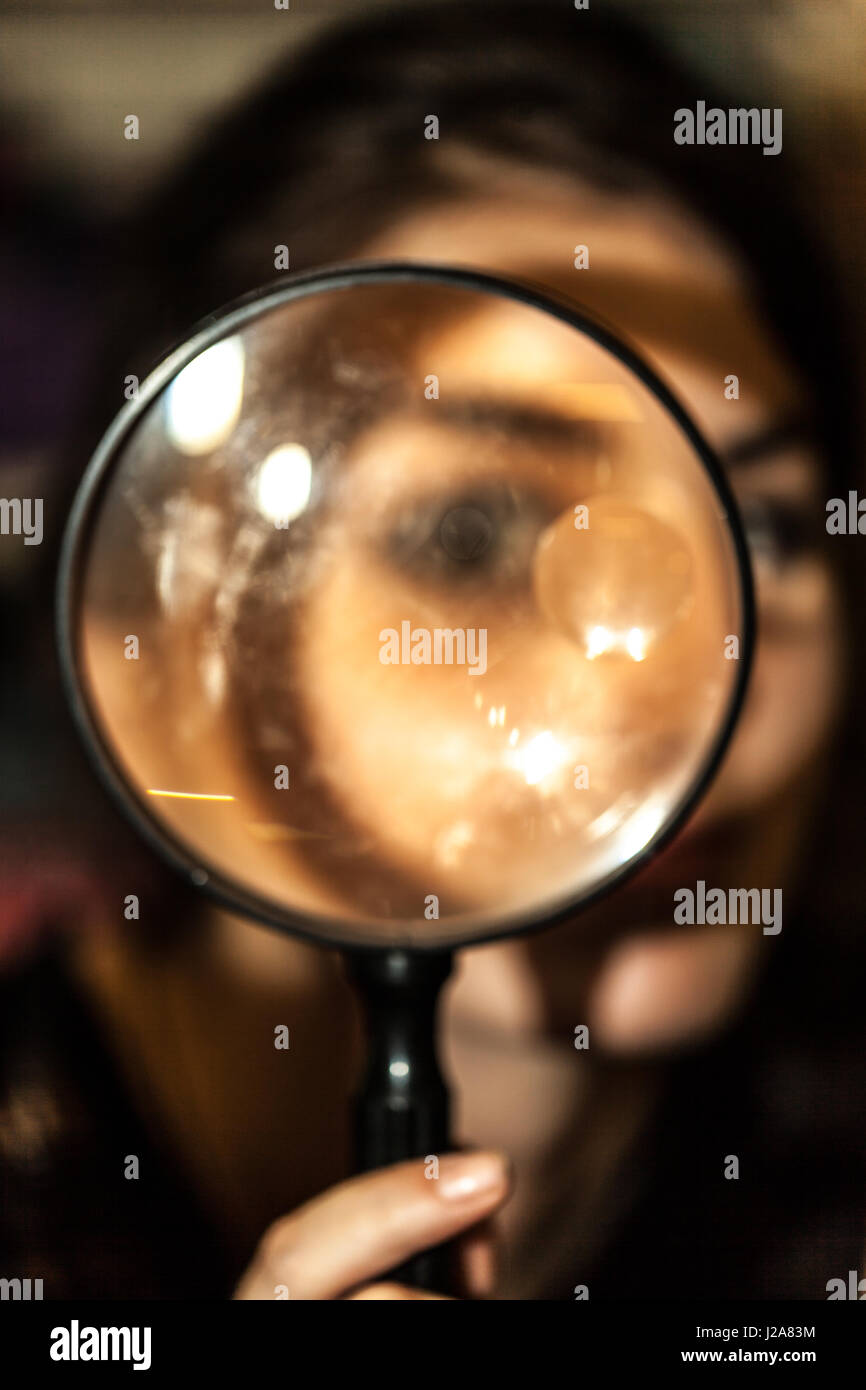 Detective looking clues magnifying glass hi-res stock photography and ...