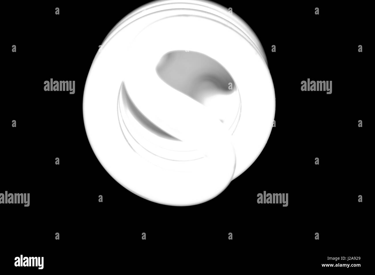 Economic light bulb on balck background Stock Photo - Alamy