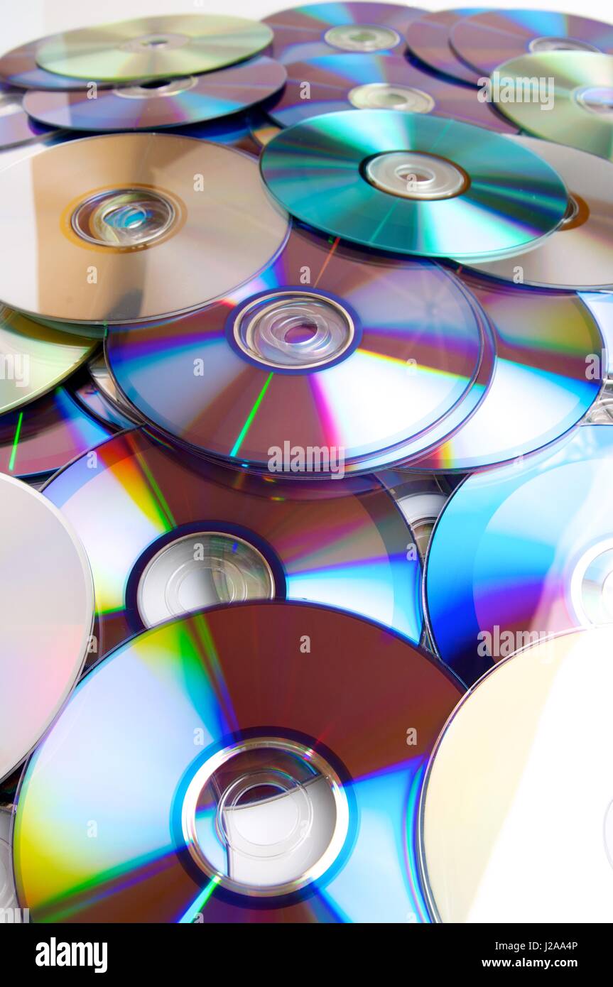 Given a set of DVDs scattered on a table Stock Photo - Alamy