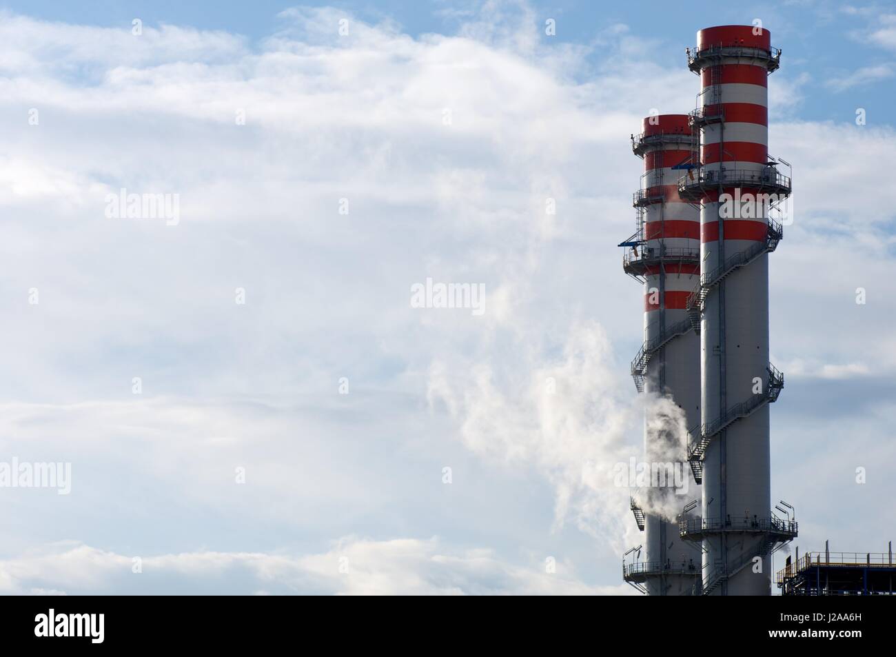 smokestacks of a power plant for electric energy production Stock Photo ...