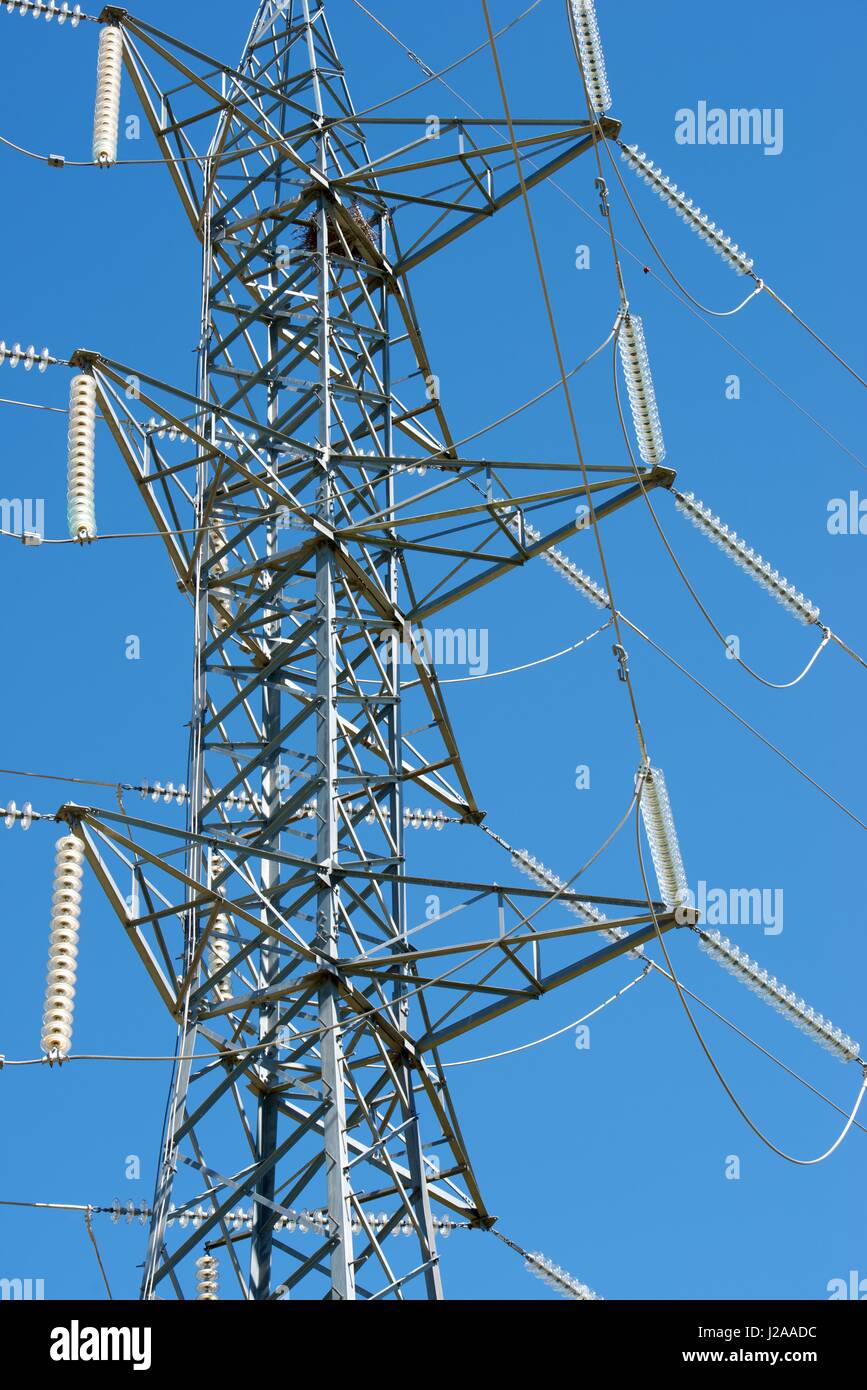 close up of a high voltage tower with blue sky Stock Photo - Alamy