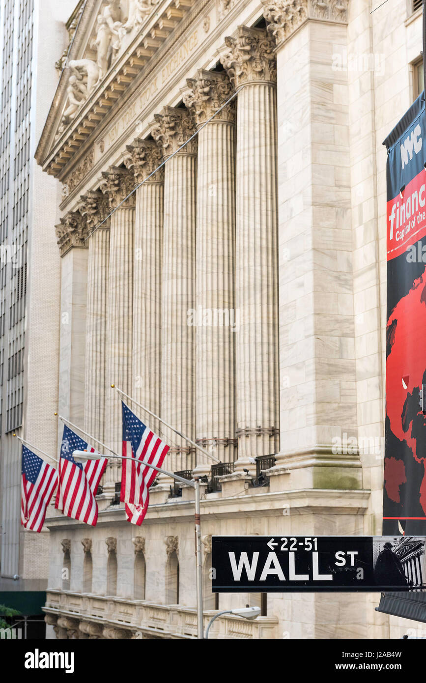 Wall street sign and New York Stock Exchange background Stock Photo - Alamy