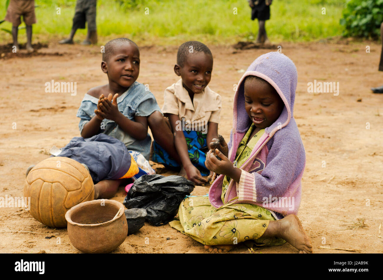 Children playing ball rural africa hi-res stock photography and images ...