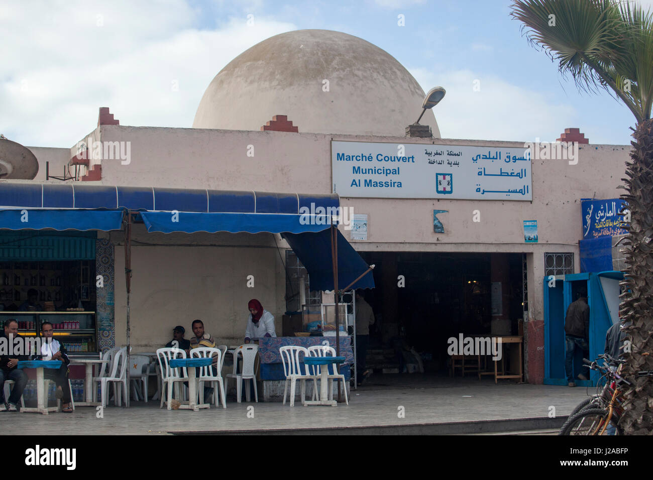 Africa, Western Sahara, Dakhla. People at outdoor seating of a public ...