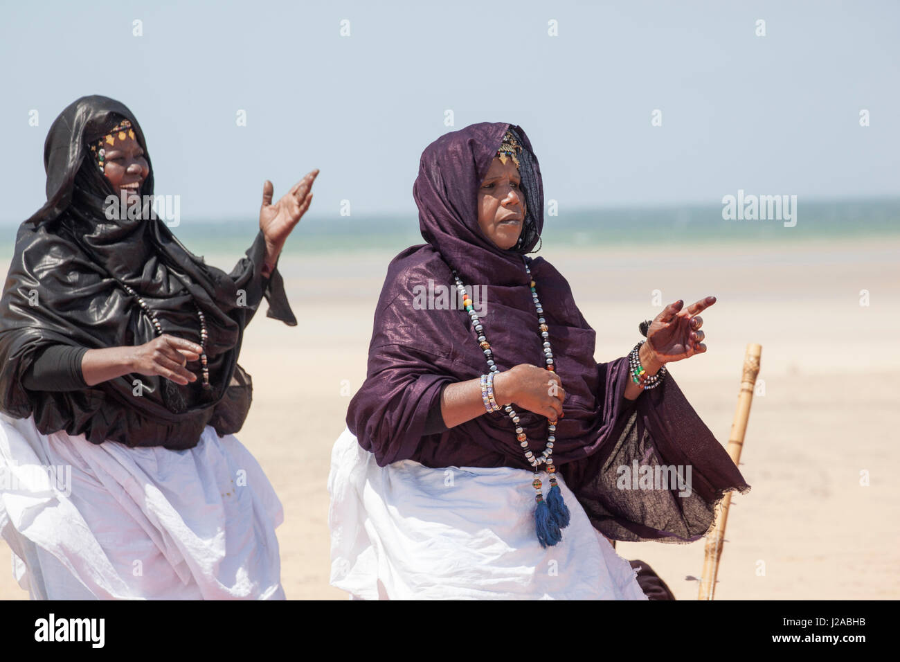 Africa, Western Sahara, Dakhla. Two women in traditional dress ...