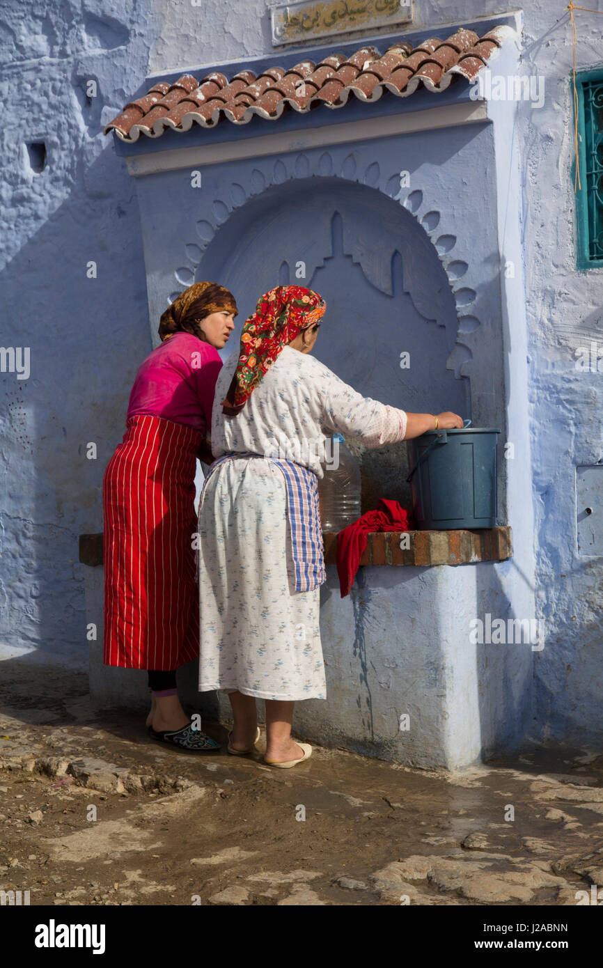 Morocco, Chefchaouen, aka Chaouen, local women in traditional dress ...