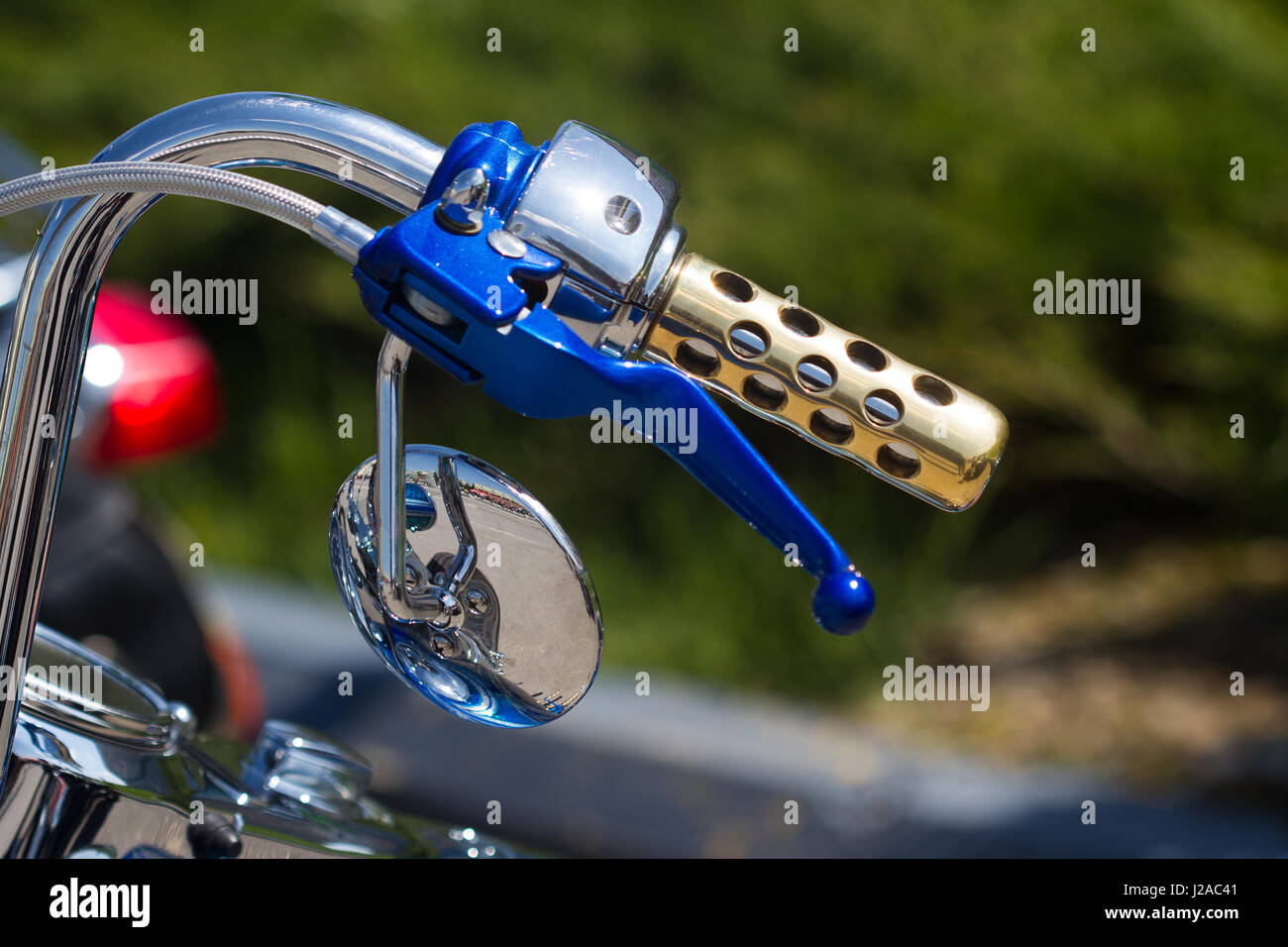 custom blue classic motorcycle handlebar detail isolated in white ...