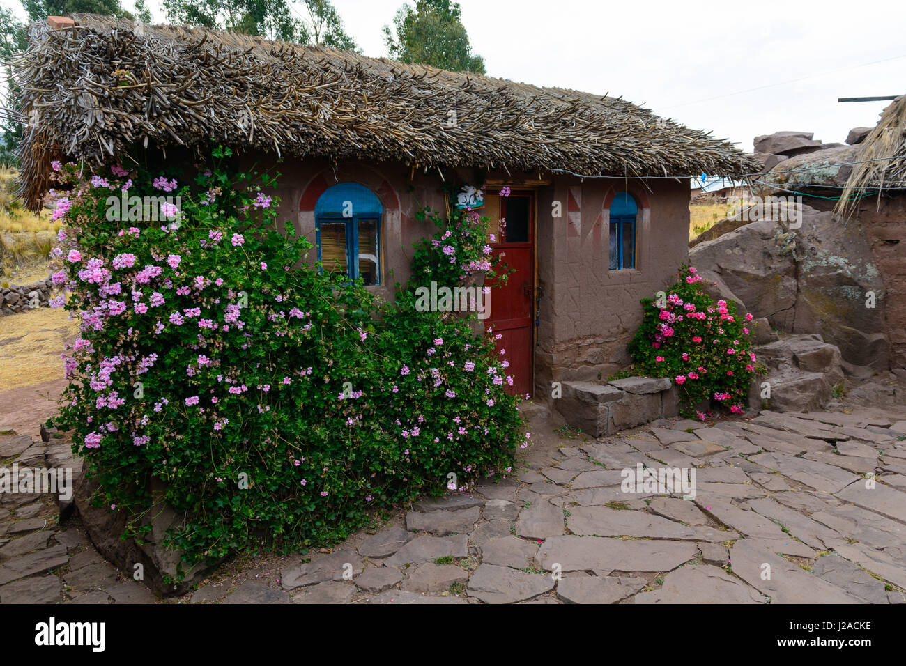 Peru, Puno, accommodation in traditional mud brick cottages ("Adobe ...