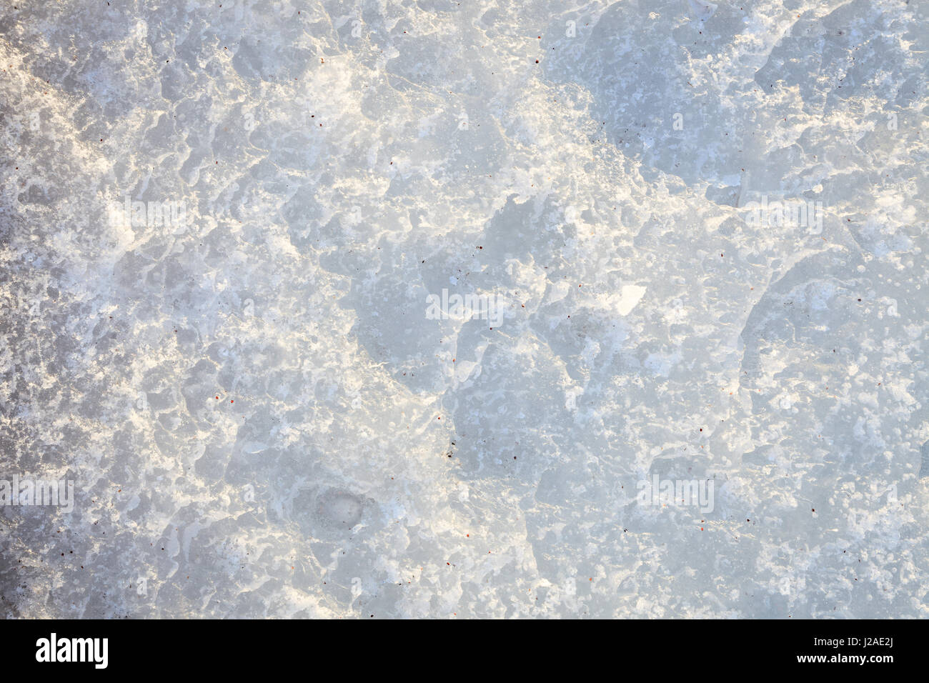 Rough ice surface texture Stock Photo - Alamy