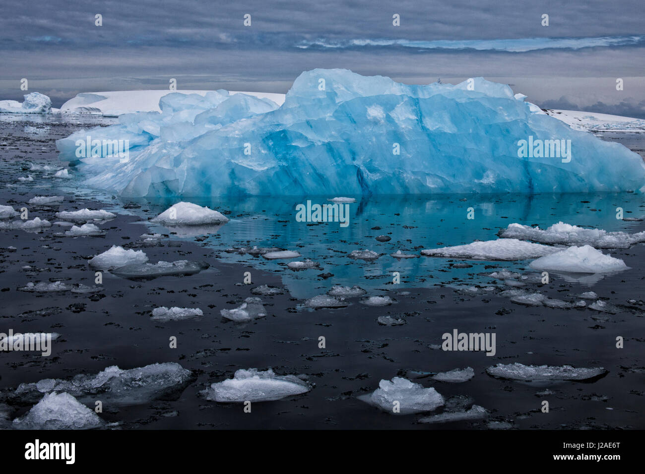 Antarctica. An overturned iceberg Stock Photo - Alamy