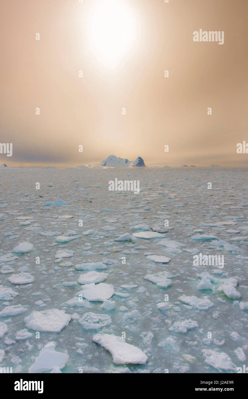 Grandidier, Antarctica. Sea Ice and the Antarctic Sun Stock Photo - Alamy