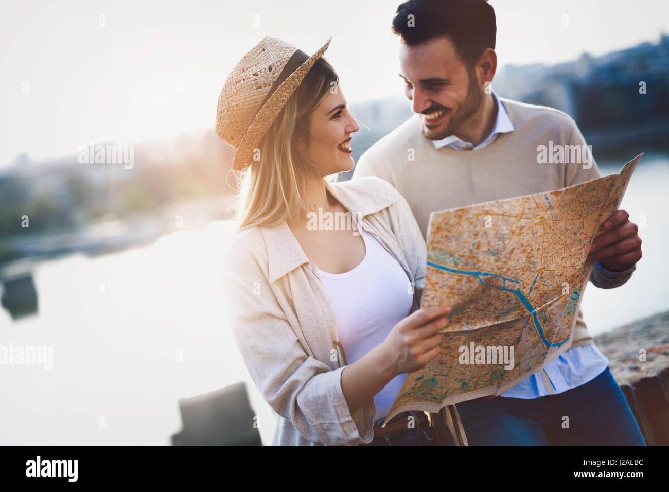 Beautiful tourist couple in love traveling and sightseeing Stock Photo ...