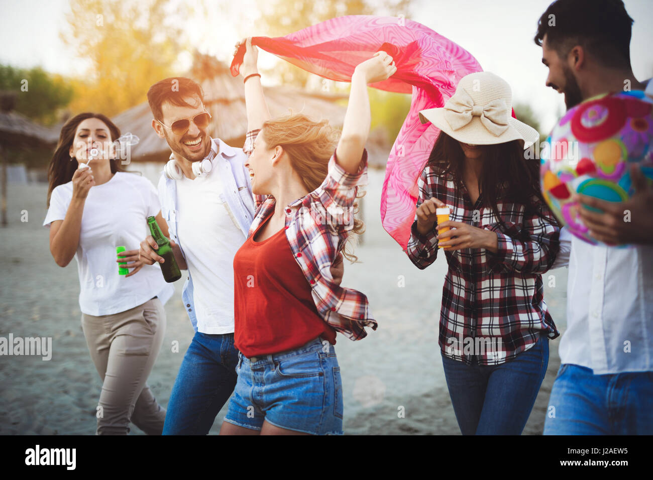 Friends having fun on beach hi-res stock photography and images - Alamy