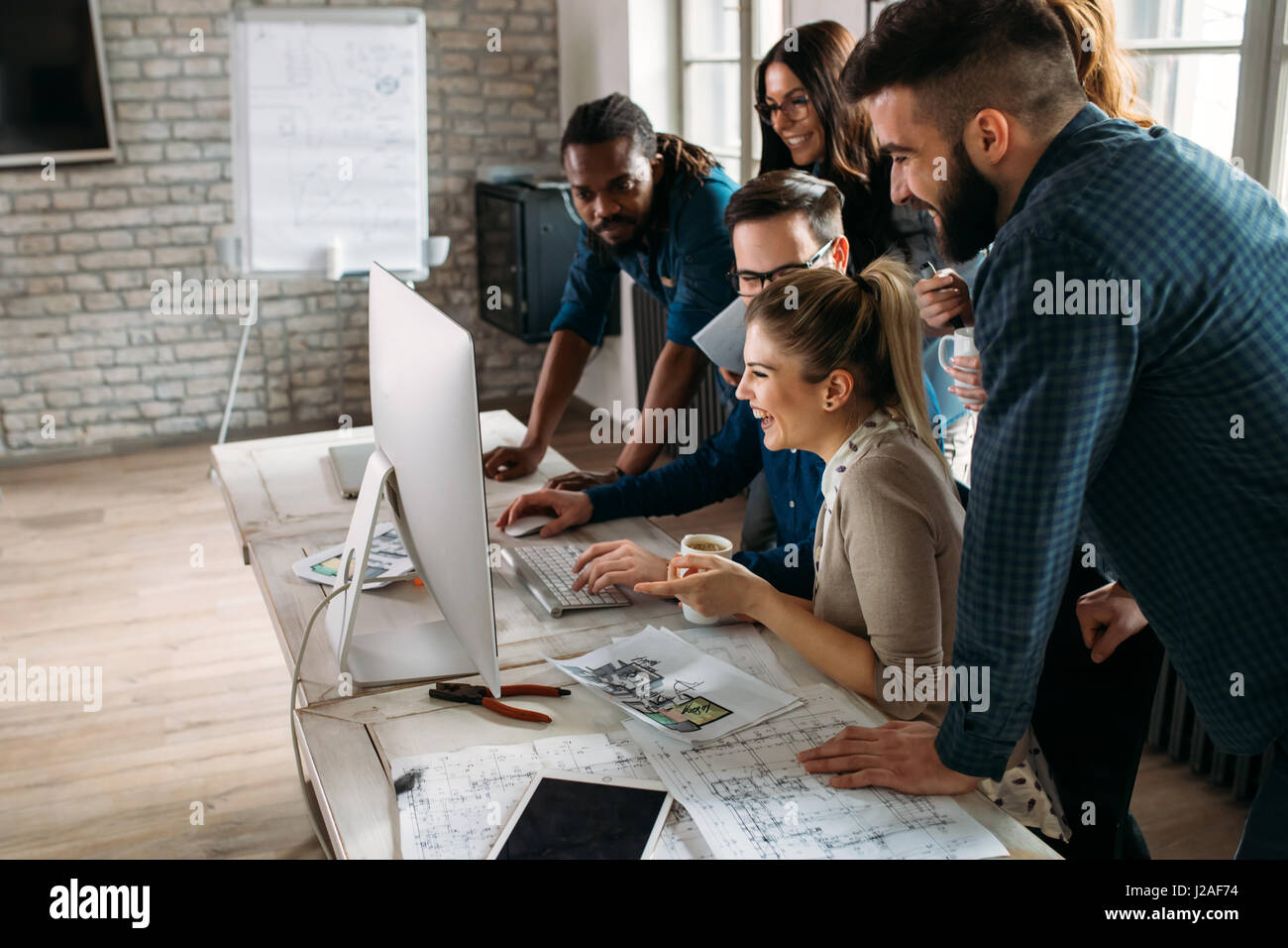 Company employees working in software hi-res stock photography and ...