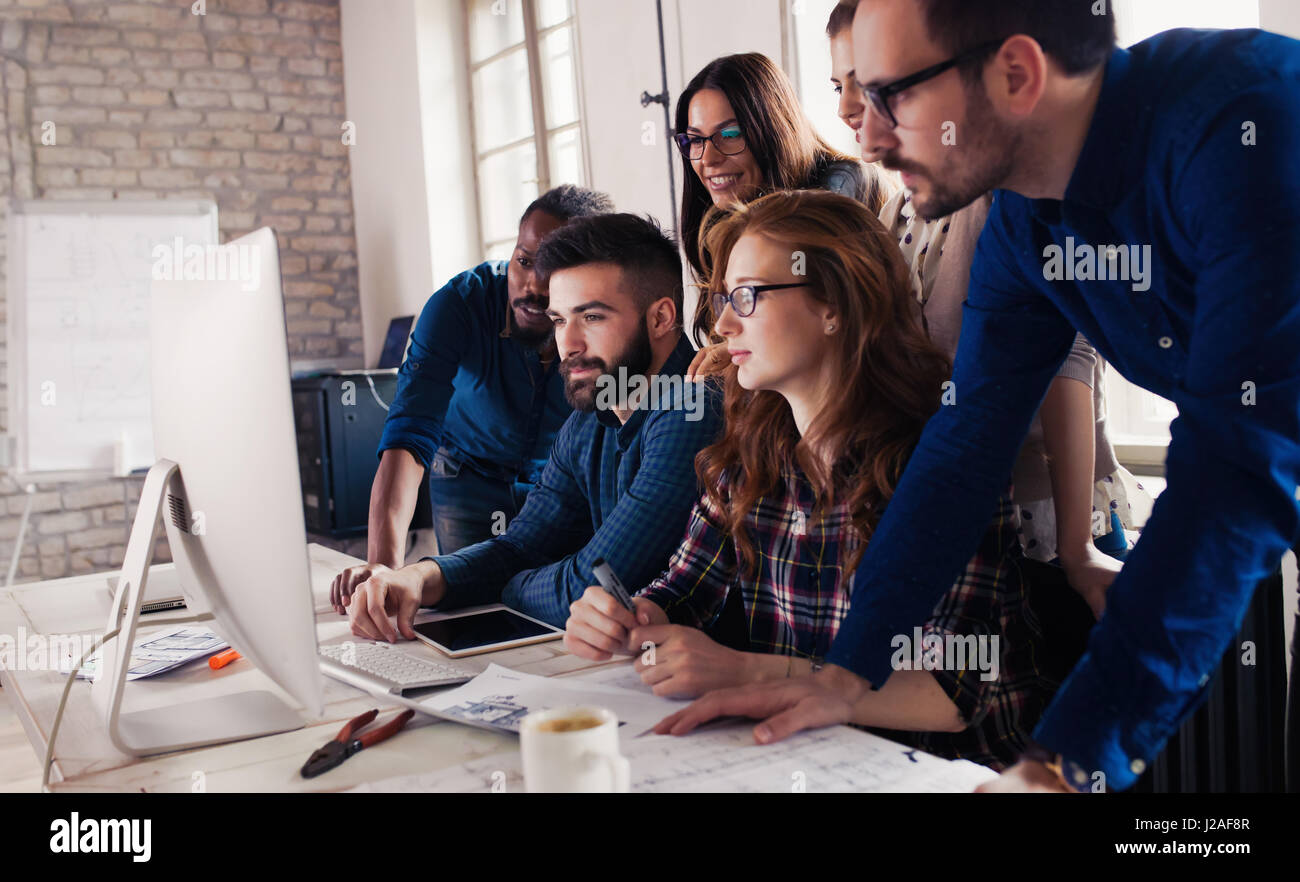 Company employees working in software hi-res stock photography and ...