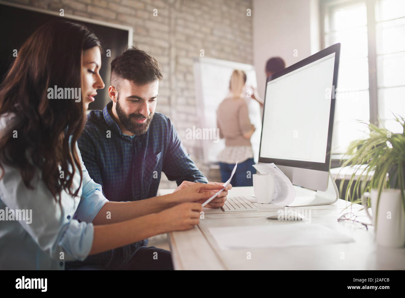 Software engineers working on project and programming in company Stock Photo - Alamy