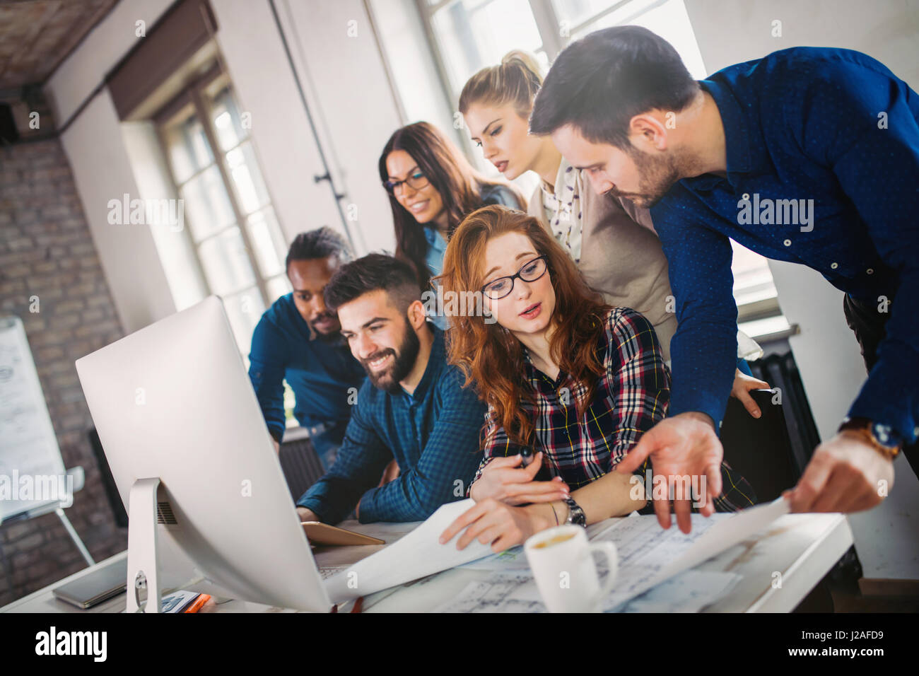 Company employees working in software hi-res stock photography and ...