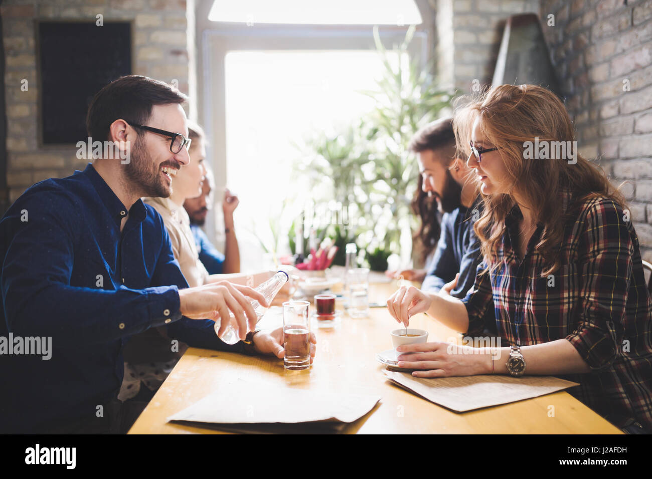 Women out socializing together hi-res stock photography and images - Alamy