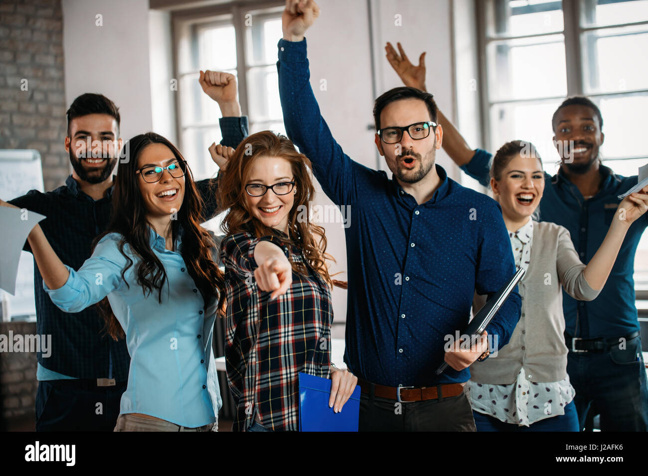 Happy smiling employee employees hi-res stock photography and images ...