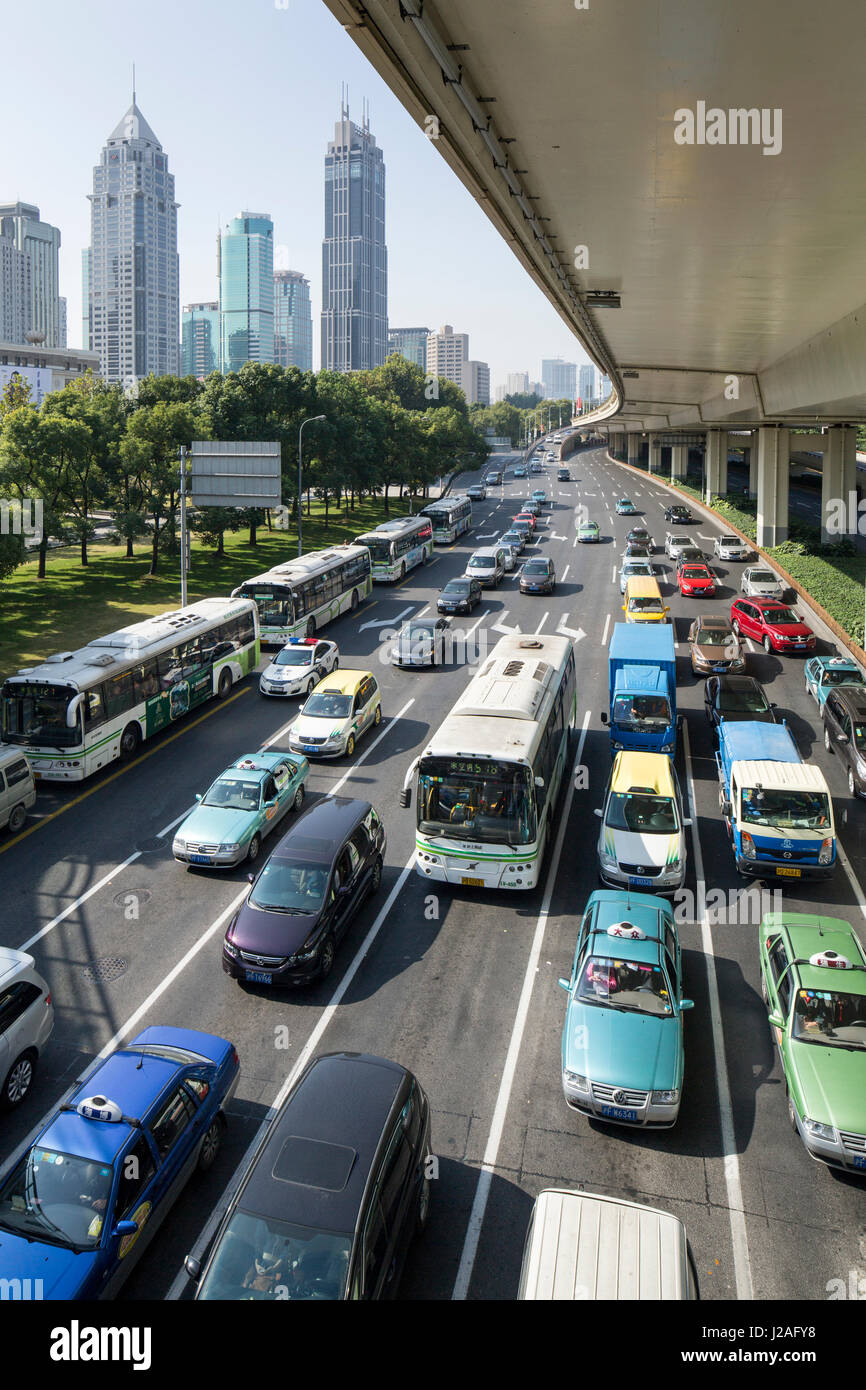 China, Shanghai, Morning traffic jam along Yan'an Road beneath ...