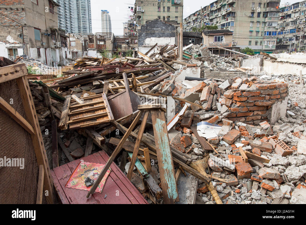 China, Shanghai, Destroyed concrete and bricks remains of apartment ...