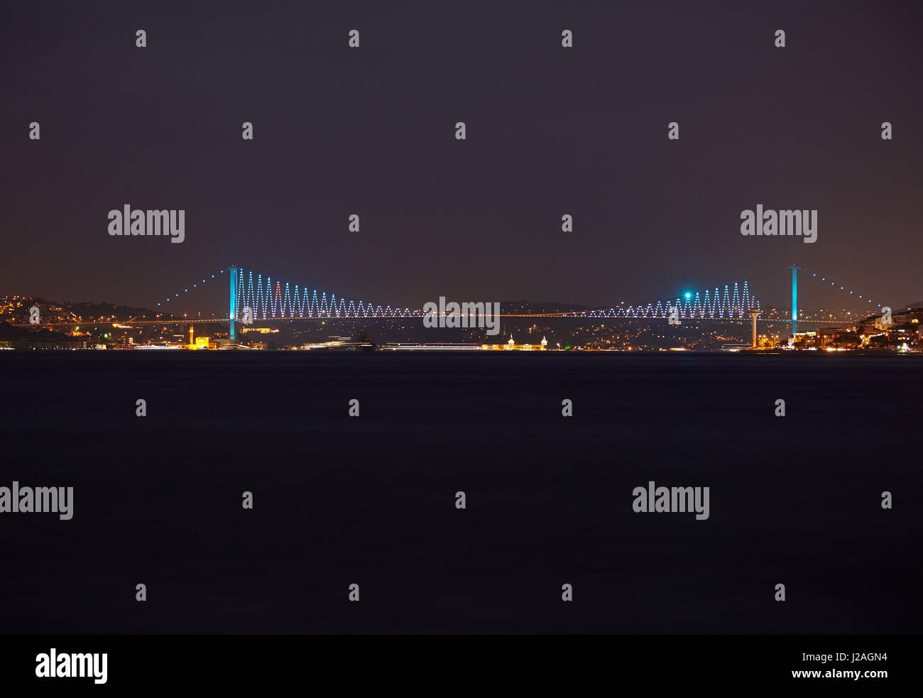 The night view of the Bosphorus with the illuminated Bosphorus bridge ...