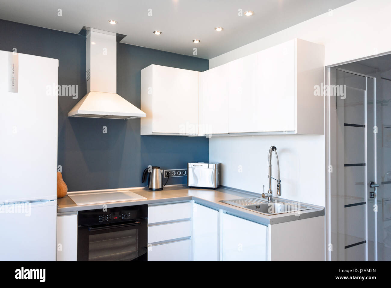 Interior of modern kitchen in a spacious apartment Stock Photo - Alamy