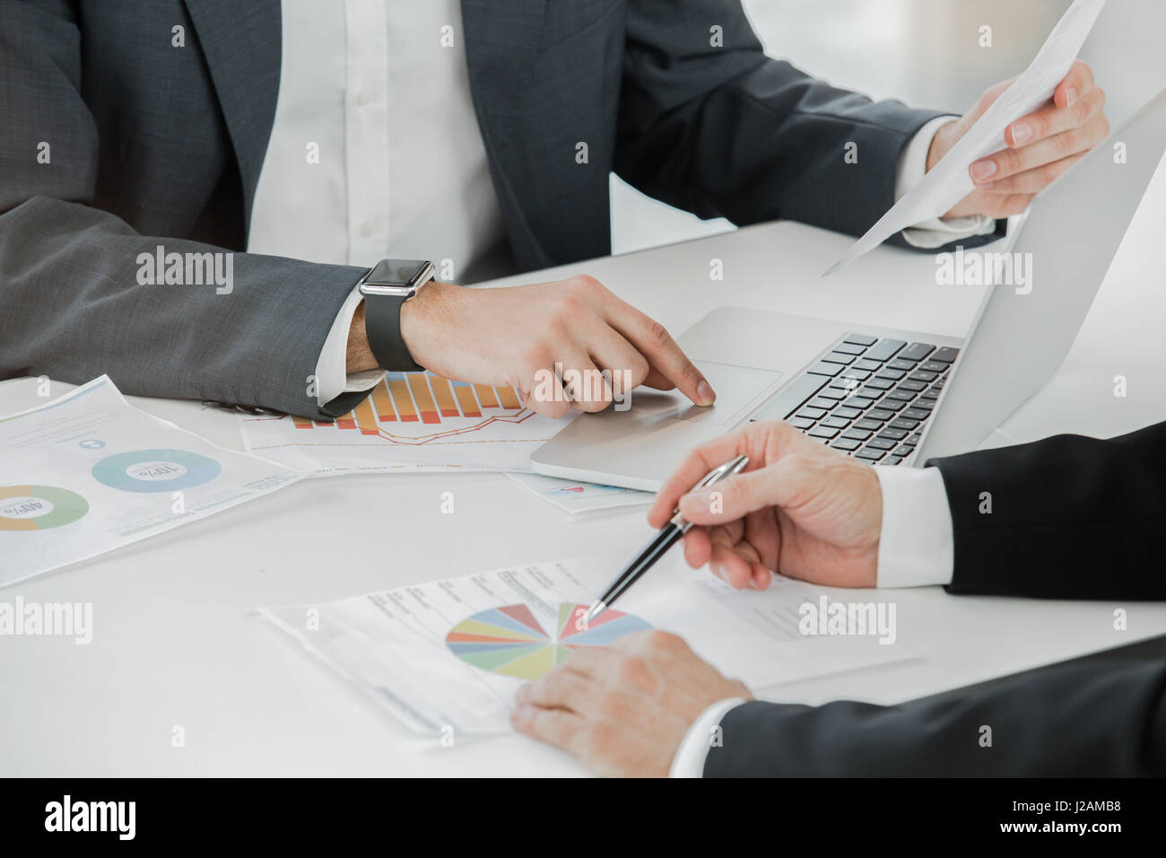 Stylish businessmen working in office Stock Photo - Alamy