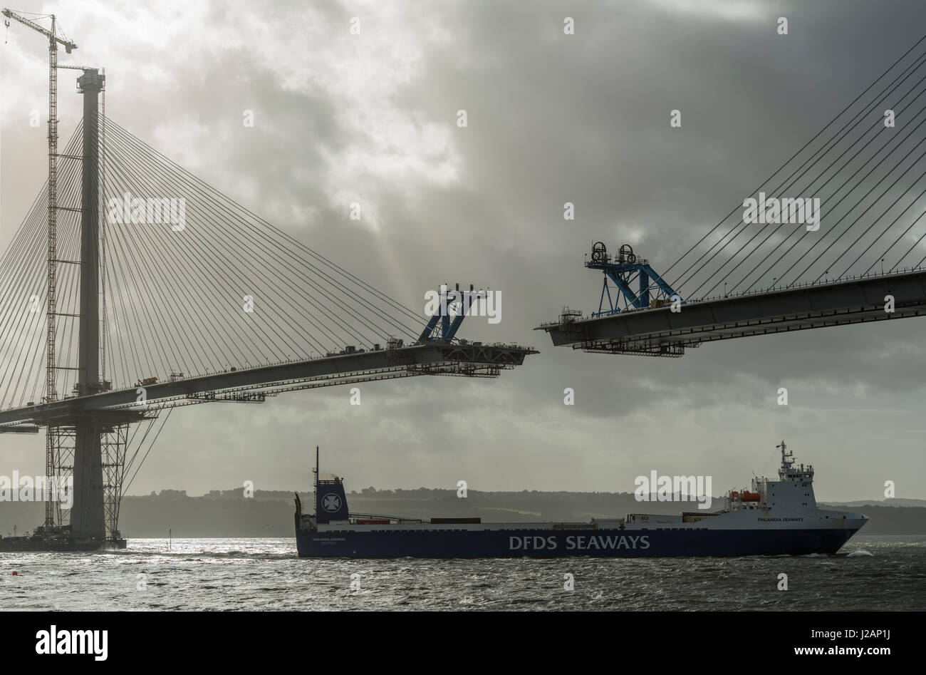 Container ferry passing Queensferry Crossing under construction, North ...