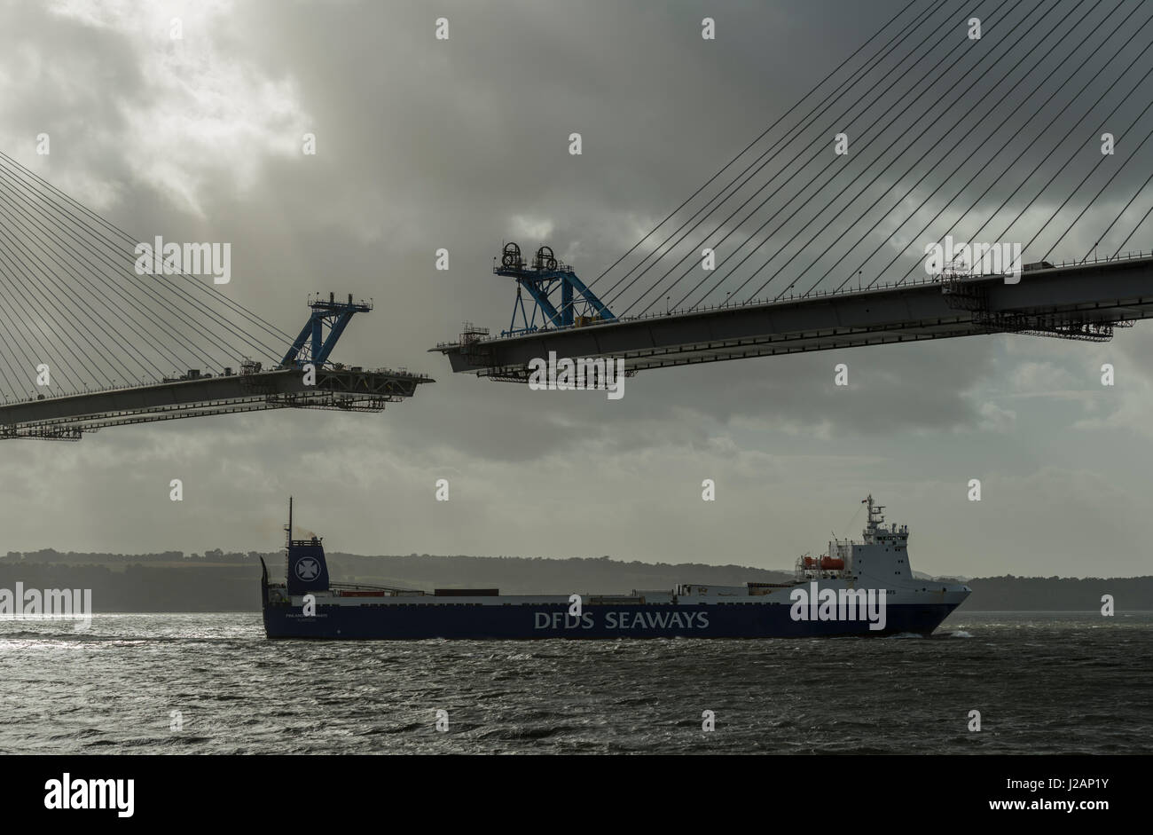 Container ferry passing Queensferry Crossing under construction, North ...