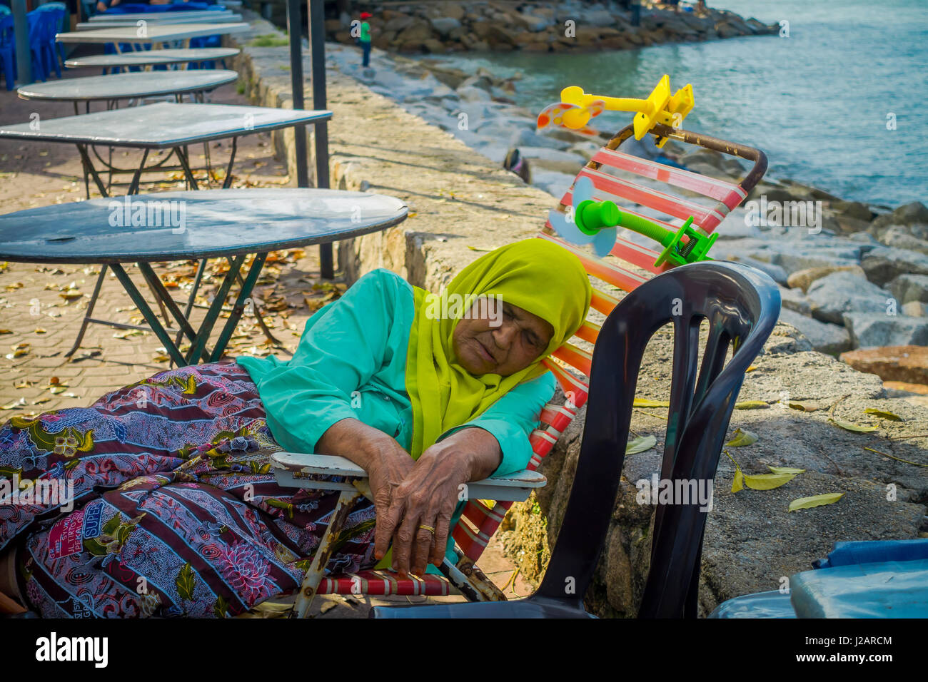 George Town, Malaysia - March 10, 2017: Close up view of unidentified ...