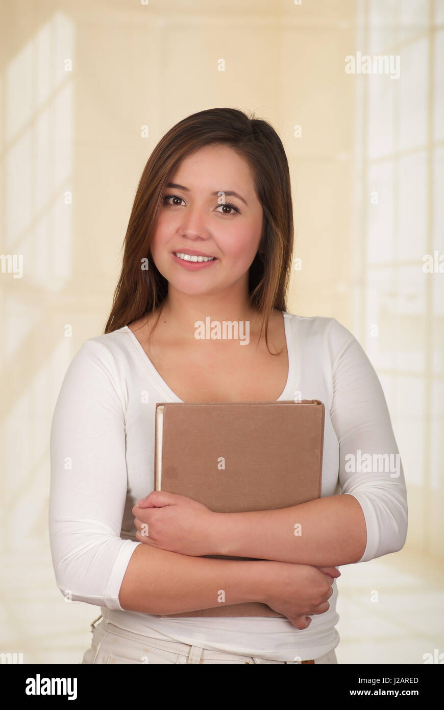 Young Pretty Woman Hiding Behind Open Book Stock Photo - Alamy