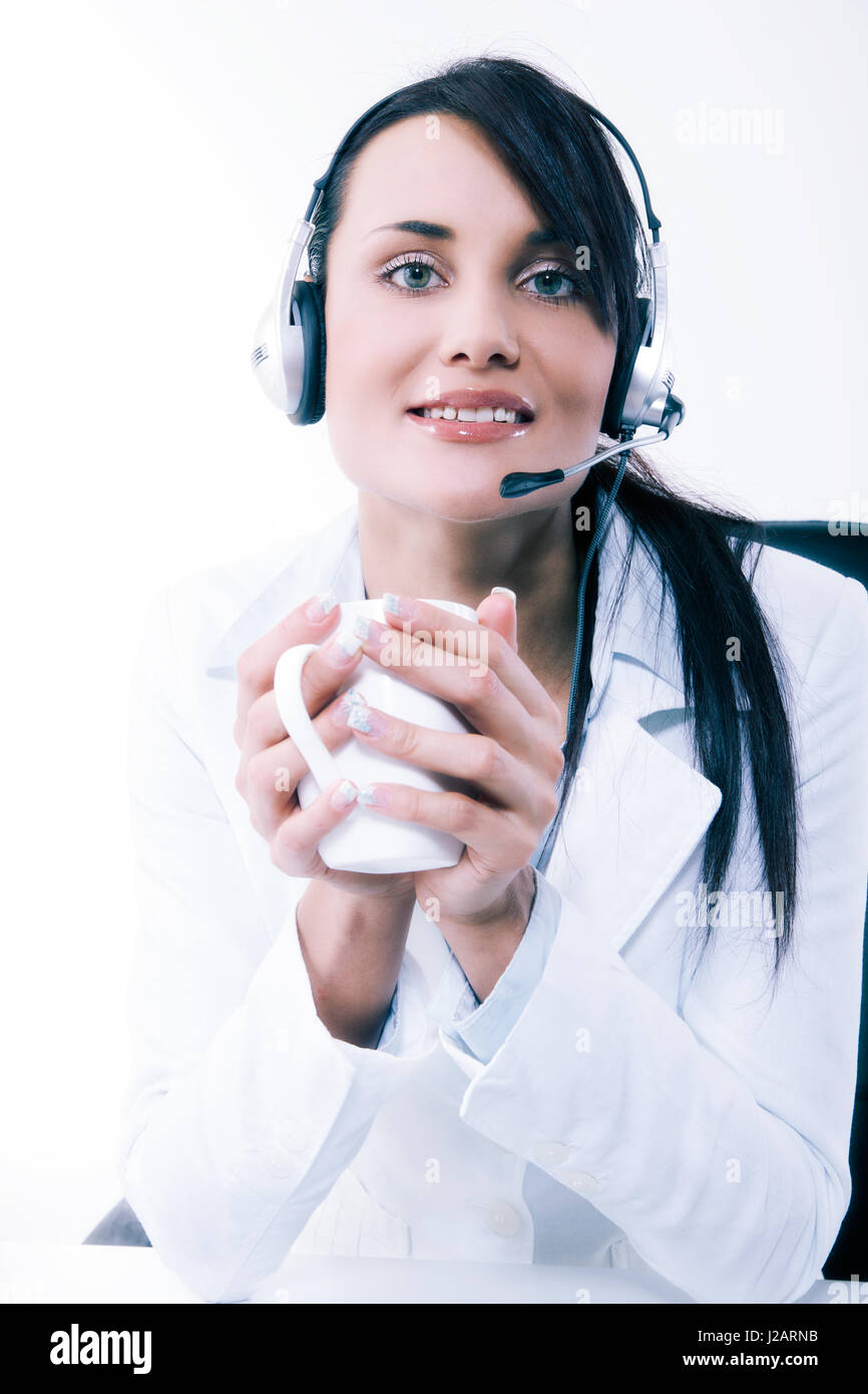 Female call center service operator at work. Attractive female helpdesk ...