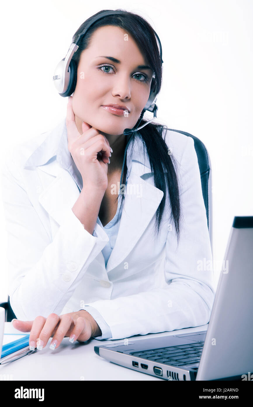 Female call center service operator at work. Attractive female helpdesk ...