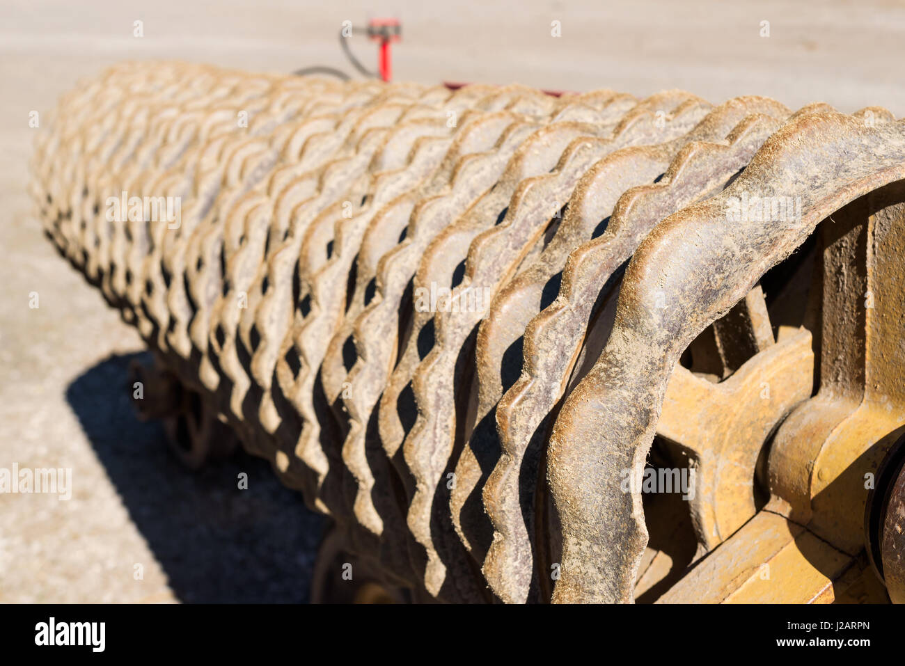 Heavy soil roller seen in detail from one side Stock Photo - Alamy