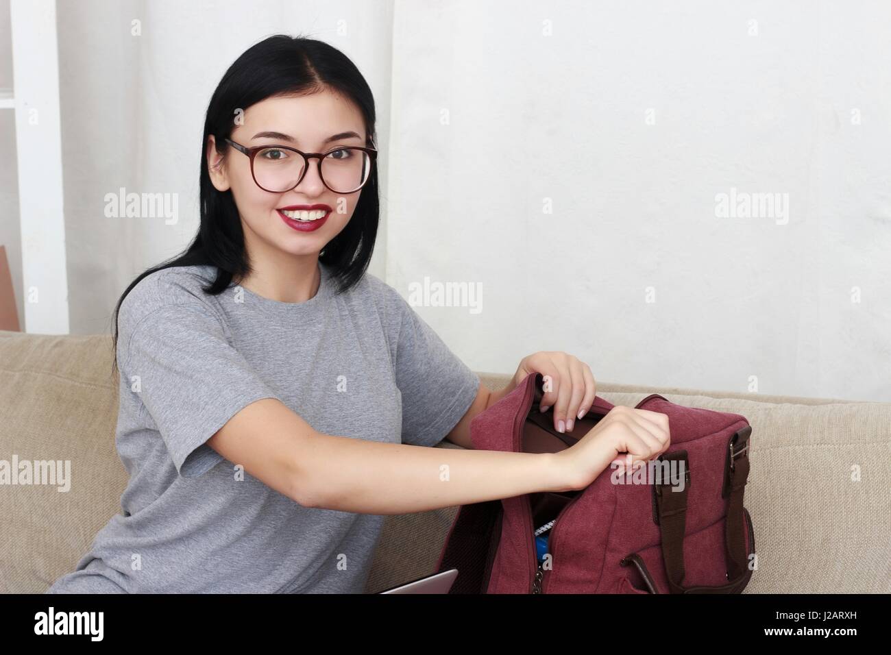 Casual girl female student bag hi-res stock photography and images - Alamy