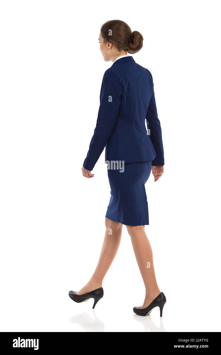 Business Woman Walking Rear View Cut Out Stock Images & Pictures - Alamy