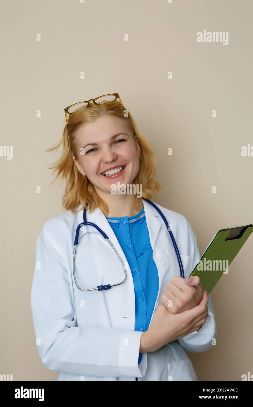 Doctor girl with green folder Stock Photo - Alamy