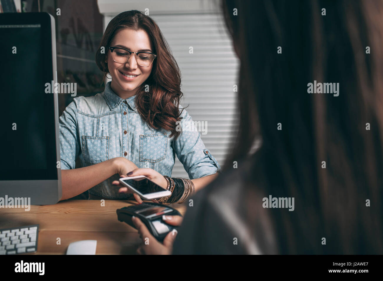 Pay at counter hi-res stock photography and images - Alamy